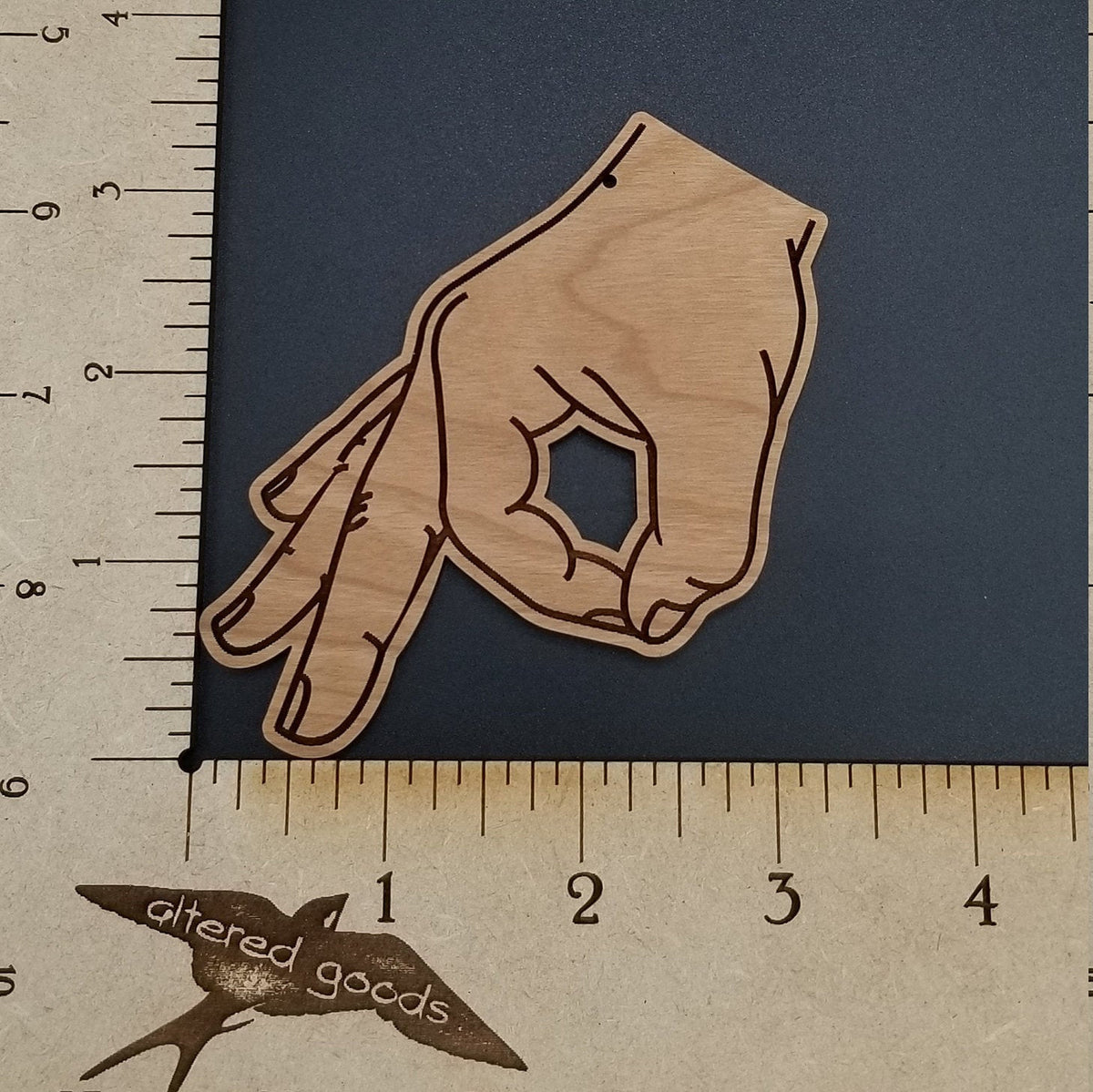 Circle game hand wood ornament – Altered Goods